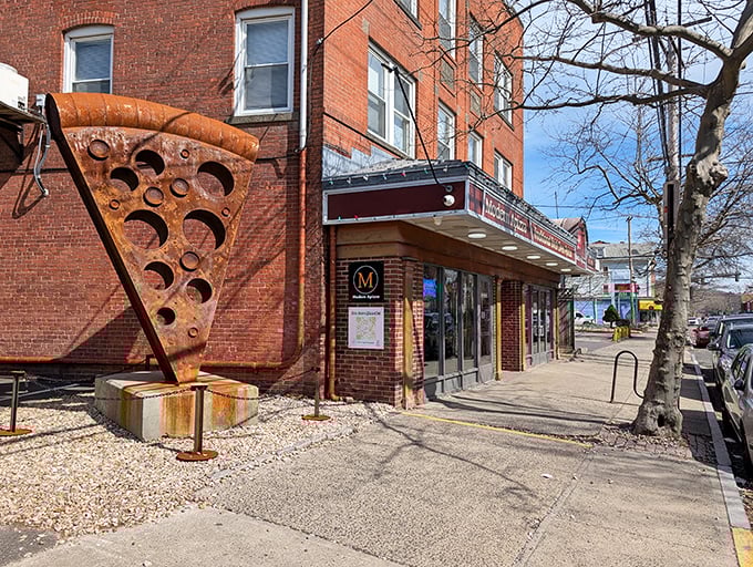 Modern Apizza: Brick building, classic signage, and that rusty pizza sculpture&mdash;the holy trinity of "this place knows what they're doing."