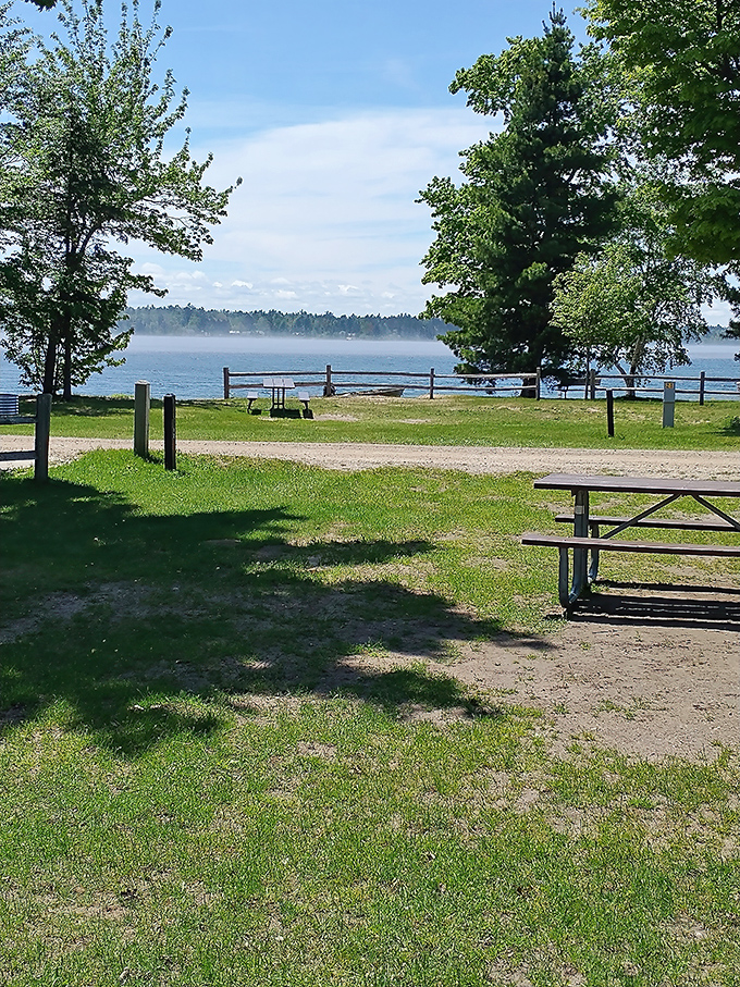 Morning mist rises off Muskallonge Lake, creating the kind of scene that makes amateur photographers look like professionals.