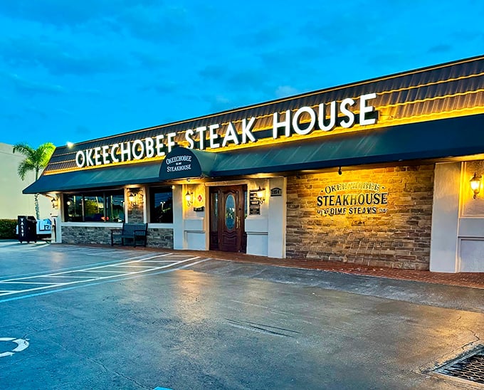 Evening light bathes this West Palm Beach landmark in a golden glow - decades of steak perfection await inside.