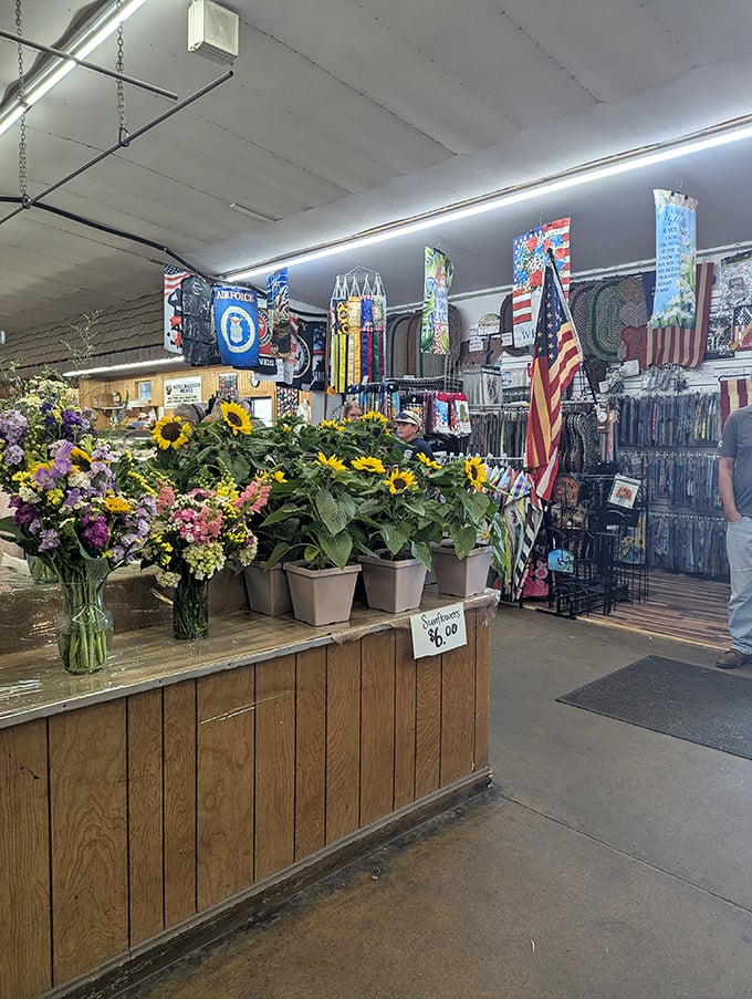 Step into a botanical wonderland! Root's flower area offers a rainbow of flowering plants waiting for their forever homes.