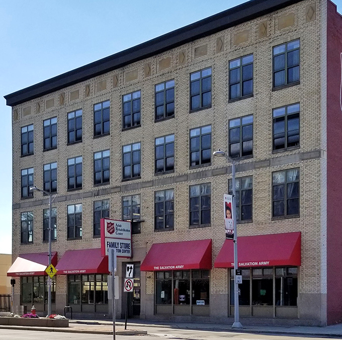 The stately brick facade and classic storefront windows hint at the building's past while housing treasures for your future.