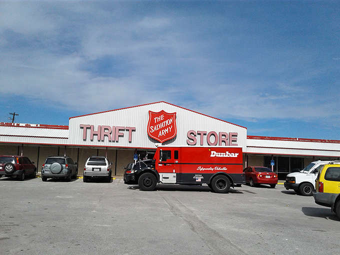 A donation truck makes its delivery, bringing fresh inventory to eager shoppers. One person's castoffs become another's treasures.