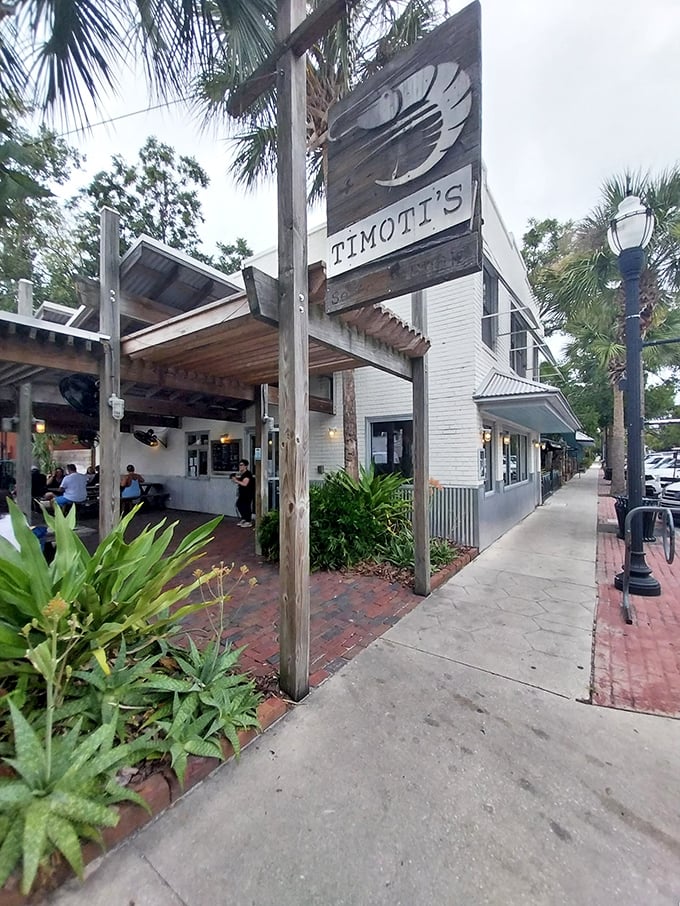 This isn't just a restaurant&mdash;it's a slice of old Florida. Timoti's wooden shrimp sign promises sweet local catches inside.