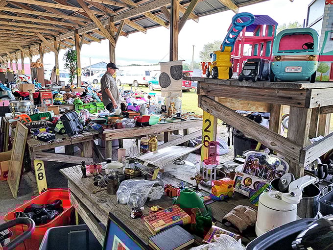 The outdoor market experience in all its glory&mdash;tables of possibilities under Florida skies and covered walkways.