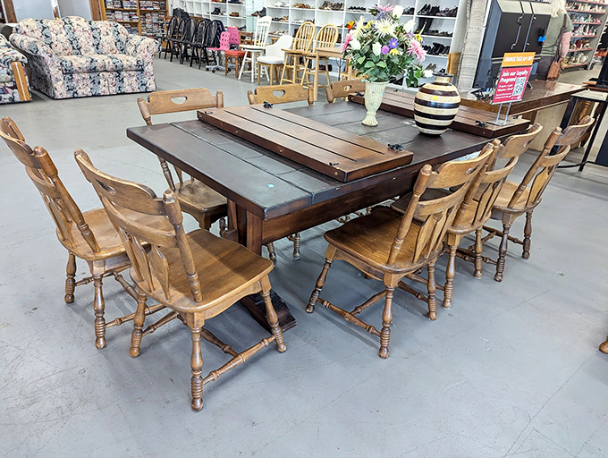 This substantial wooden dining set has hosted countless family dinners and stands ready for many more. Sunday roasts not included.