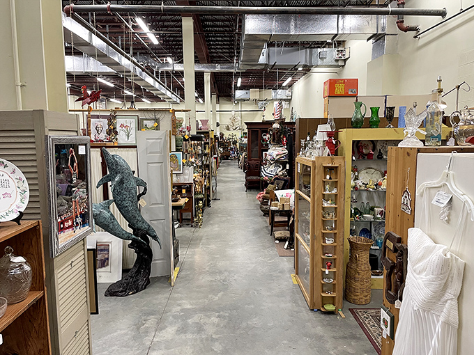 The wide, inviting aisles make treasure hunting comfortable. That dolphin sculpture is either hideous or magnificent—possibly both.