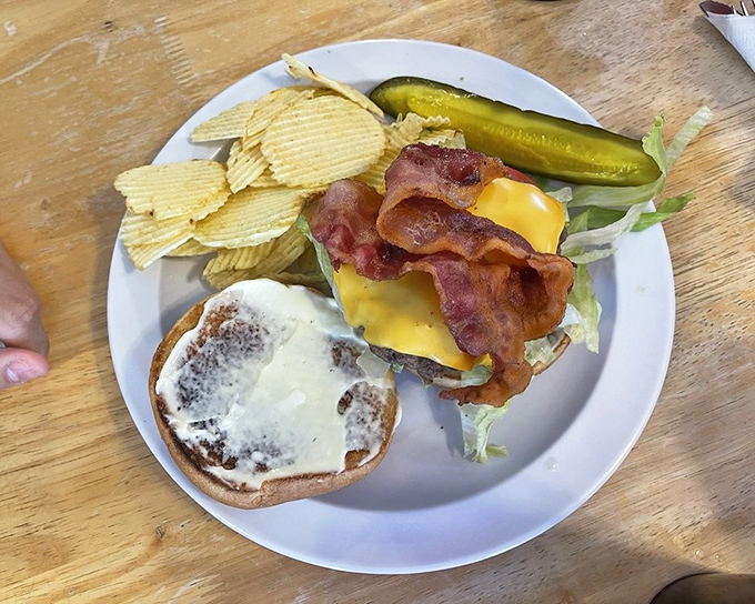 A burger that doesn't need Instagram filters to look good. The kind that makes you temporarily forget your table manners.