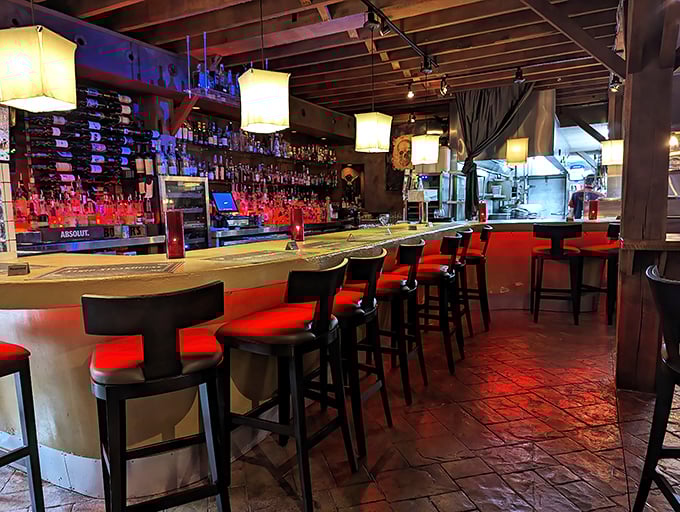 A bar that beckons you to linger. The warm lighting and impressive spirits collection suggest bartenders who know the difference between mixing drinks and crafting experiences.