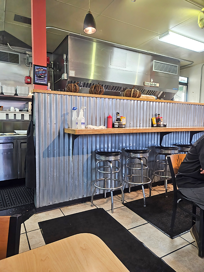 The counter seating isn't just functional—it's theater tickets to the culinary show. Front row seats to where the magic happens.