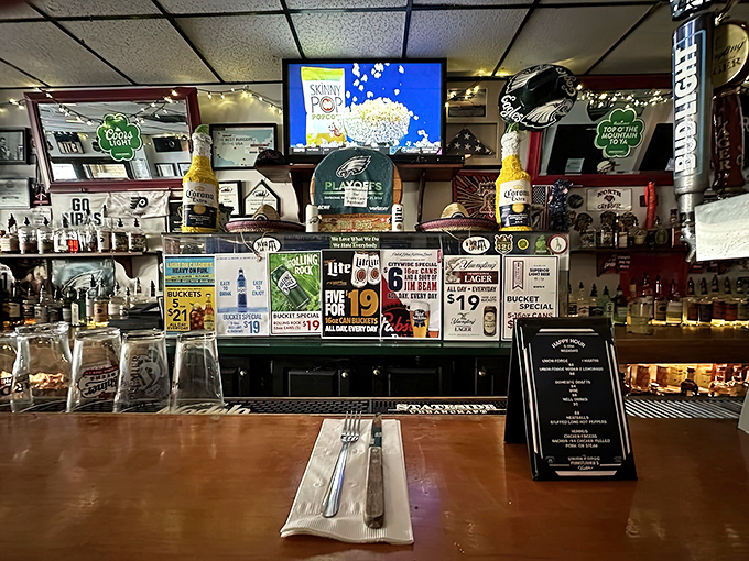 The bar area: where strangers become friends, Eagles games become religious experiences, and sandwich decisions are debated with passion.