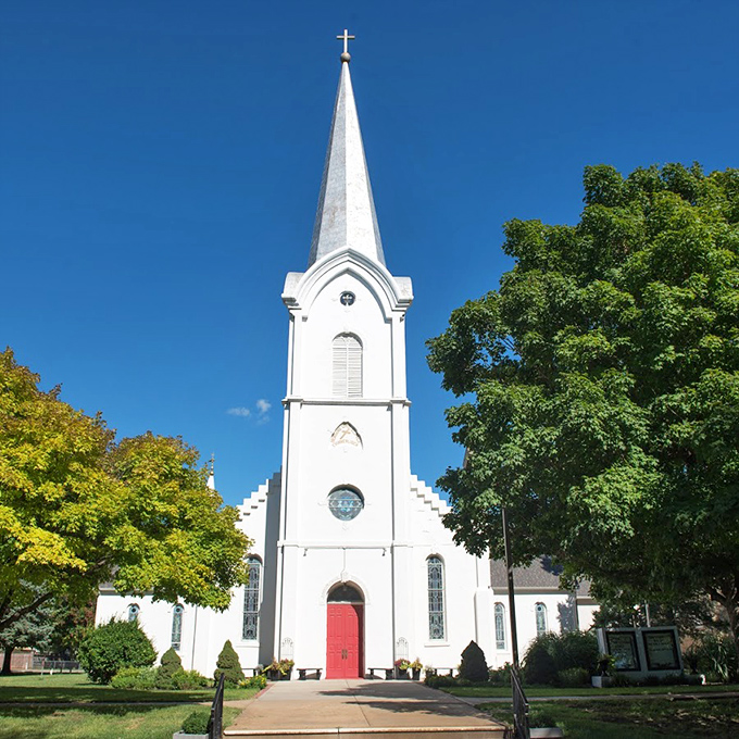 Bethany Lutheran Church's pristine white facade and soaring steeple stand as spiritual anchors in this Swedish-American community.