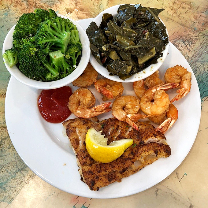 Blackened fish that's actually blackened, not burnt. Served with shrimp and sides that know their supporting role.