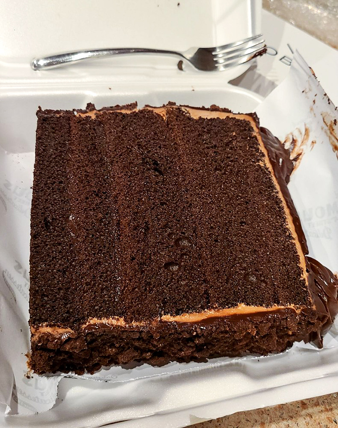 Chocolate cake so dark and rich it could pay off your mortgage. The frosting-to-cake ratio would make mathematicians weep with joy.