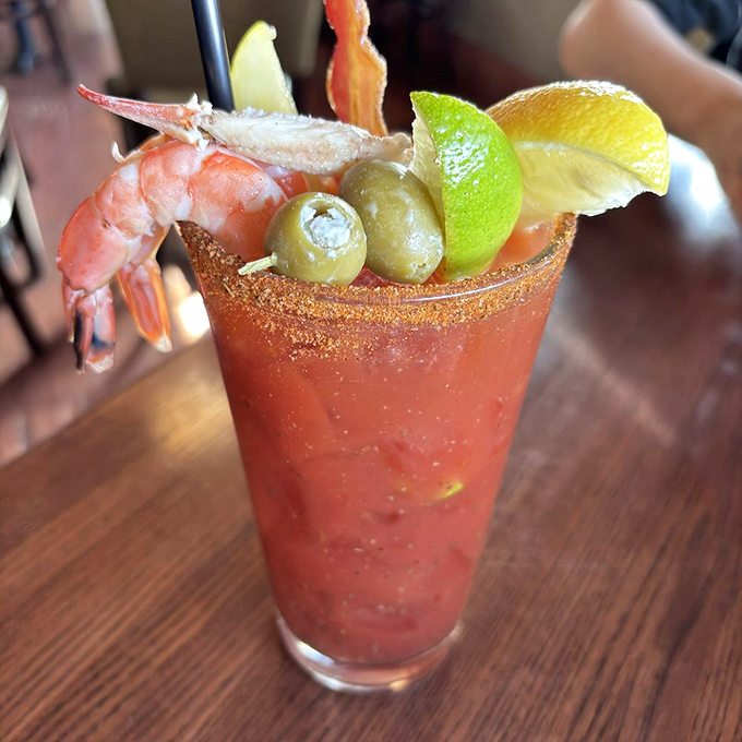 This isn't just a Bloody Mary&mdash;it's a meal in a glass with enough garnishes to count as a small appetizer. That shrimp perched on the rim is basically showing off.