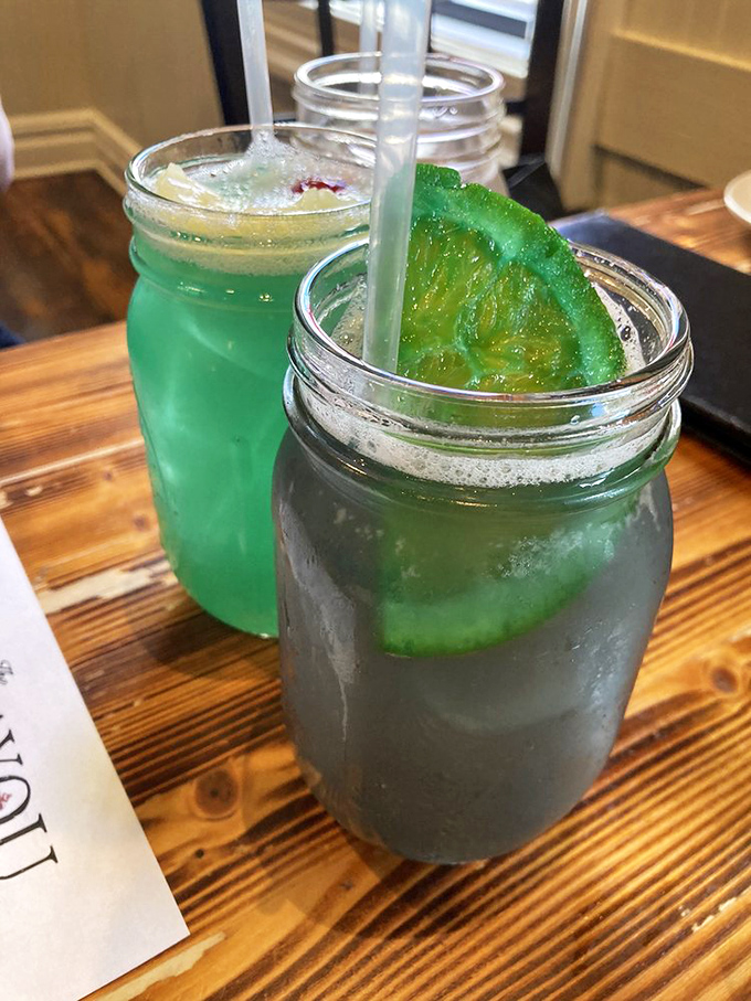 These cocktails aren't just drinks; they're vacation in a glass. The blue one practically whispers "make poor decisions with me."