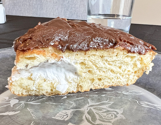 Not just Boston cream pie—this is a textural masterpiece with layers that would make a geologist weep with joy and appreciation.