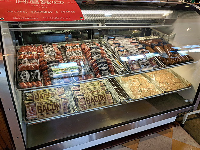 Meat candy on display! This bacon and sausage showcase is the breakfast equivalent of a jewelry store window for carnivores.