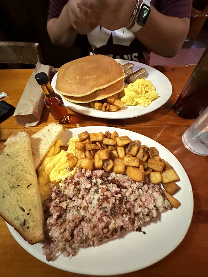 A breakfast plate that requires both a fork and a strategy. The pancakes alone could feed a small hiking club after conquering Mount Monadnock.