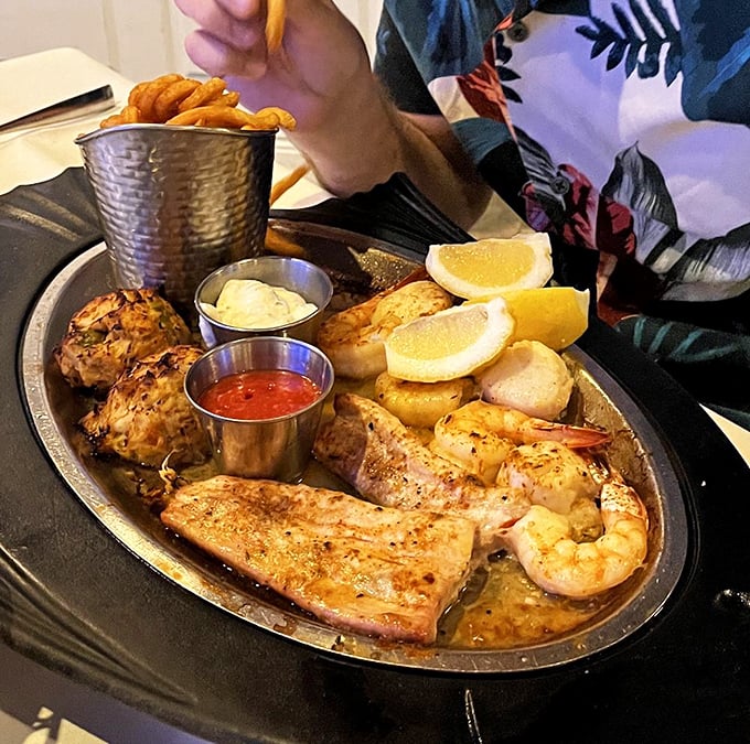 A seafood platter so generous it deserves its own ZIP code&mdash;complete with crab cakes that look like they're auditioning for a Food Network show.