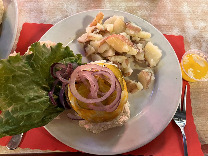 The burger sits center stage while the potato side act threatens to steal the show. A delicious dilemma indeed.