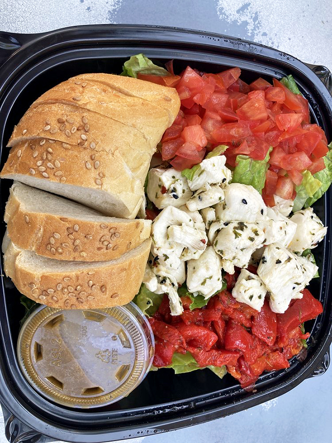 This Caprese salad brings Mediterranean sunshine to Philadelphia, a colorful arrangement that's as refreshing as it is beautiful.