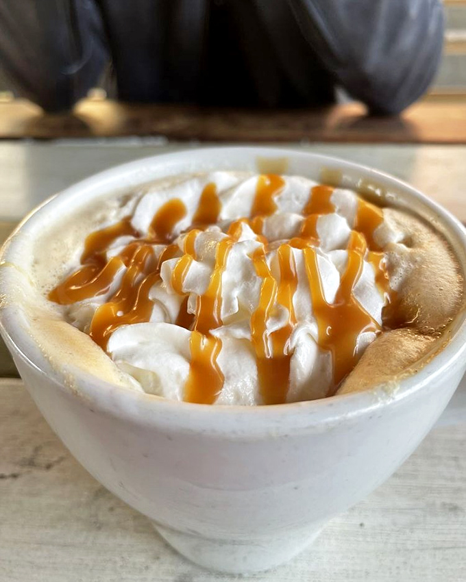 A latte that doesn't just wake you up but gives you a reason to celebrate being awake&mdash;note those perfect caramel drizzles.