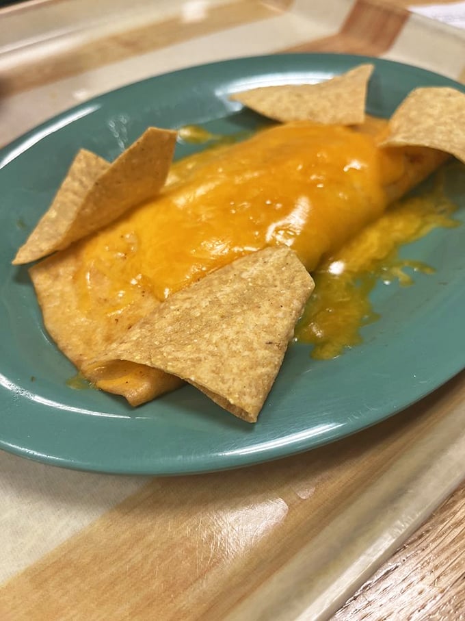 This enchilada isn't swimming in cheese&mdash;it's doing the backstroke in a pool of golden deliciousness.