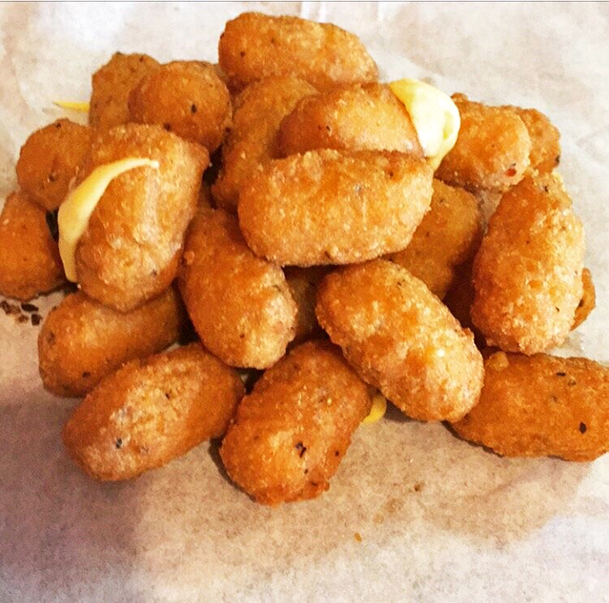 Golden-fried cheese curds that squeak in the bag and squeak in your teeth. Wisconsin's contribution to happiness. 