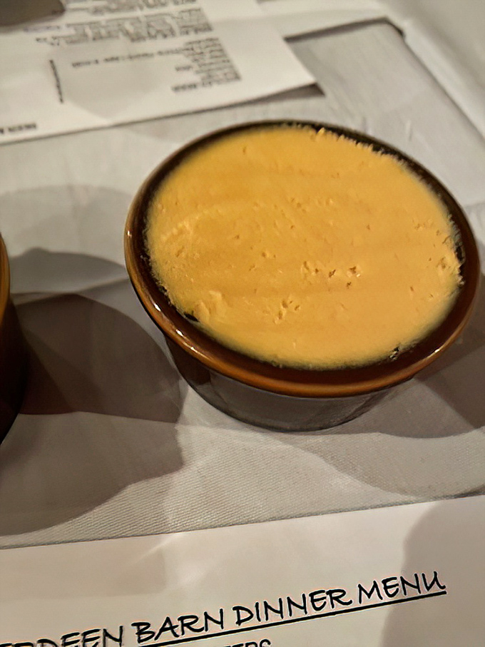 Cheese dip that demands to be photographed before it's devoured. Simple pleasures sometimes come in small brown crocks of molten goodness.