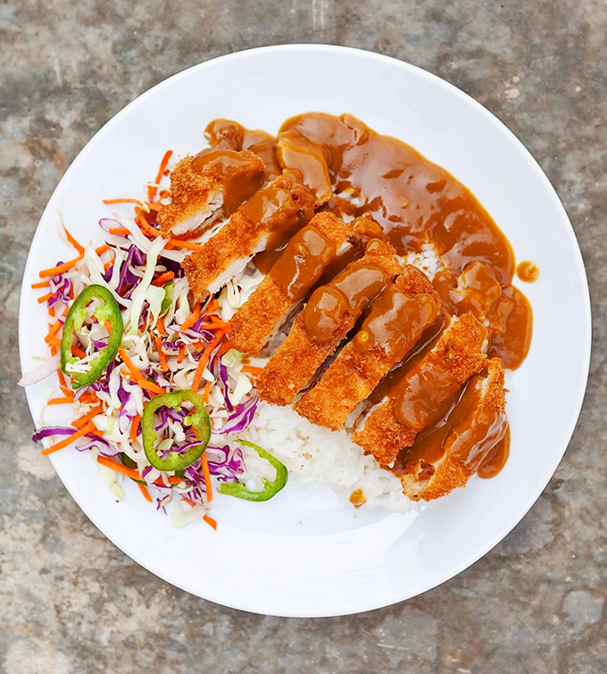 Katsu curry isn't just comfort food&mdash;it's a hug on a plate. That golden-brown cutlet lounging on rice with curry sauce is pure edible therapy.