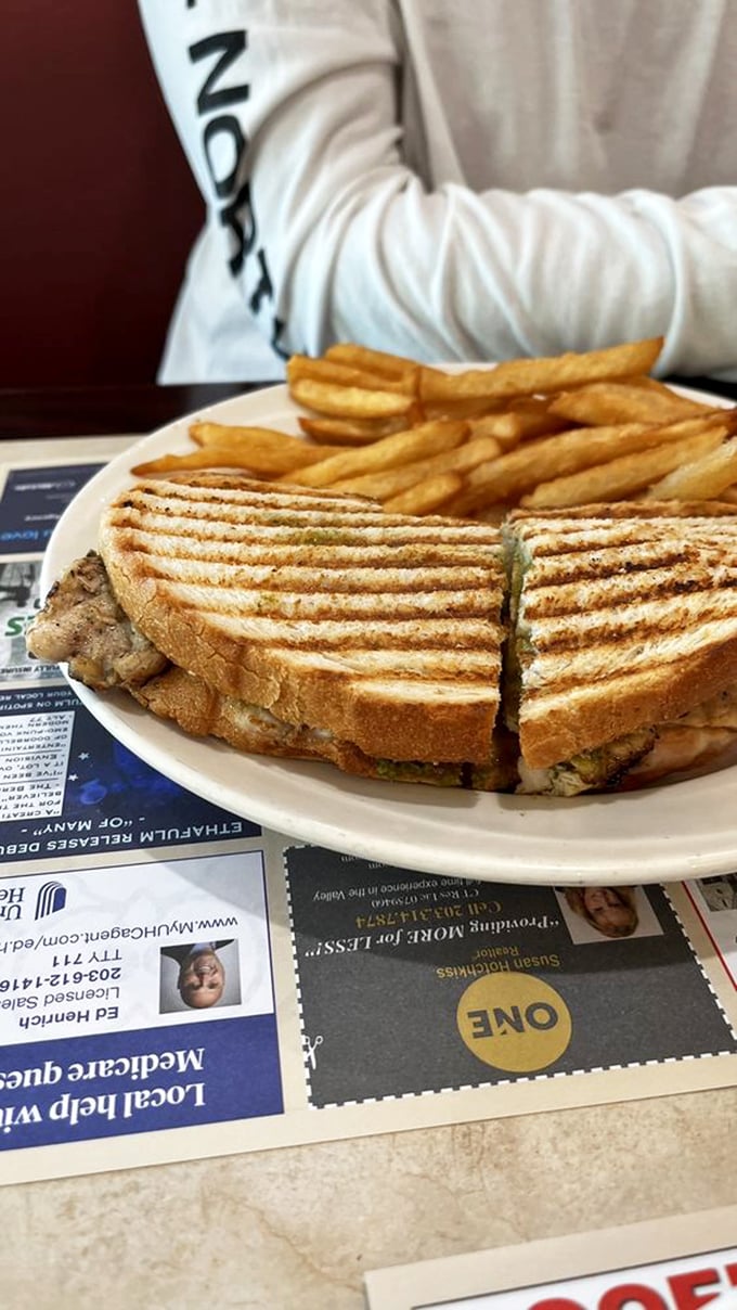Grill marks don't lie! This perfectly pressed panini promises crispy exterior, melty interior, and the kind of satisfaction that makes you plan your next visit before finishing.