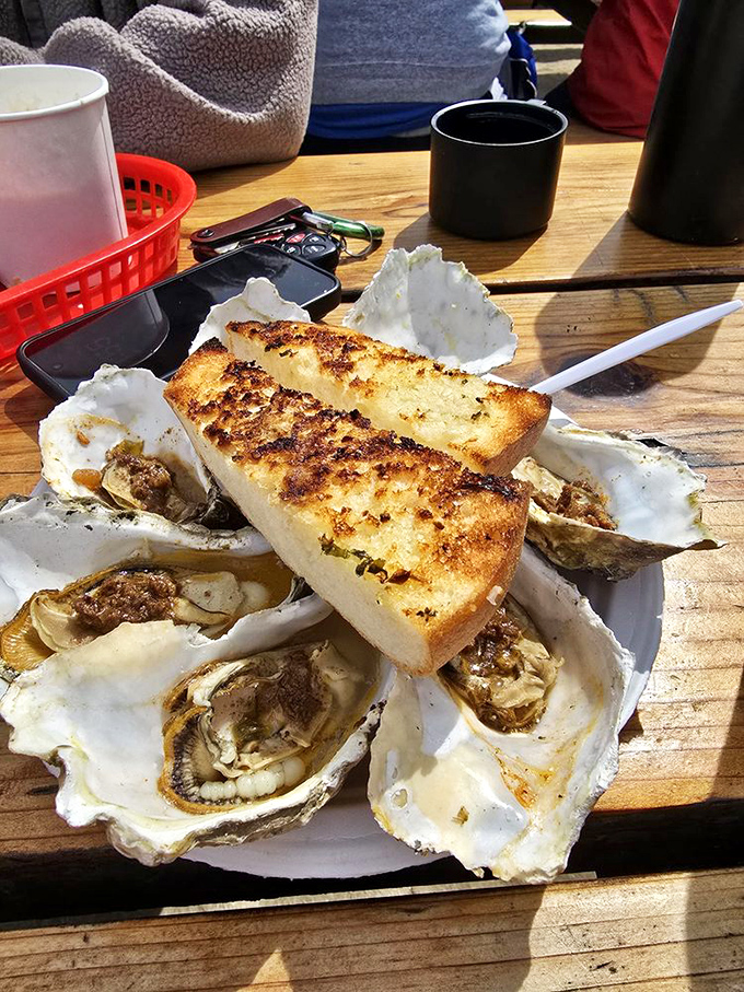 Grilled oysters and garlic bread&mdash;a match made in heaven. Like Romeo and Juliet, but with a much happier ending.