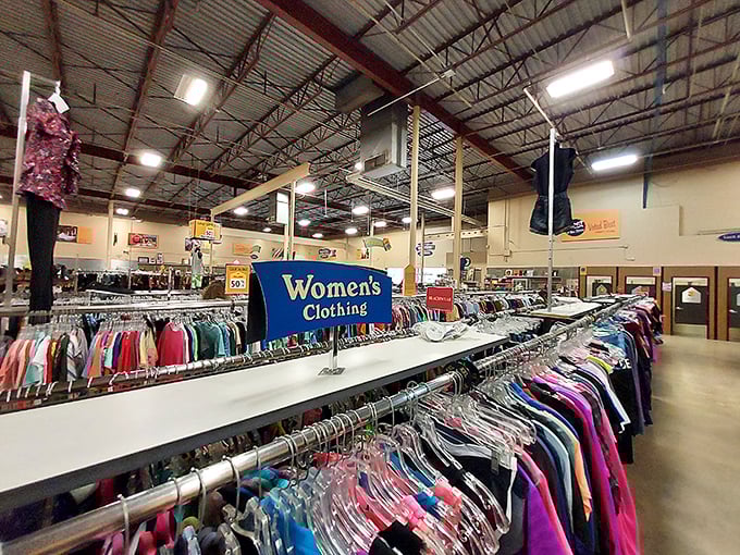 Navigate these clothing canyons with a cart and a dream. The perfect vintage find is hiding somewhere between "almost" and "absolutely."