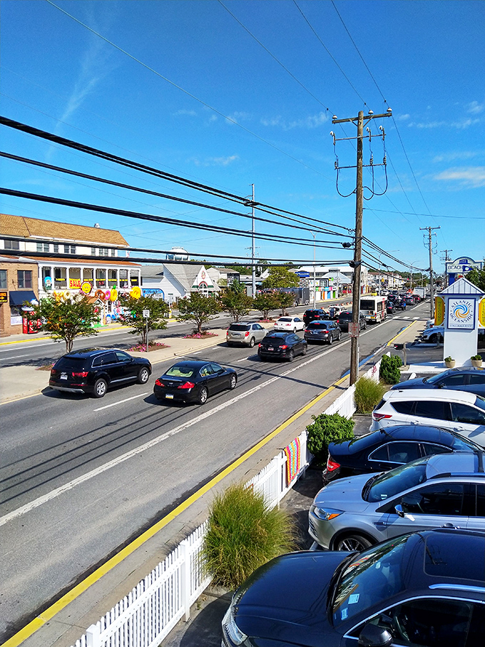 Dewey's main drag buzzes with the energy of summer seekers, each car carrying passengers on their way to salt air therapy.
