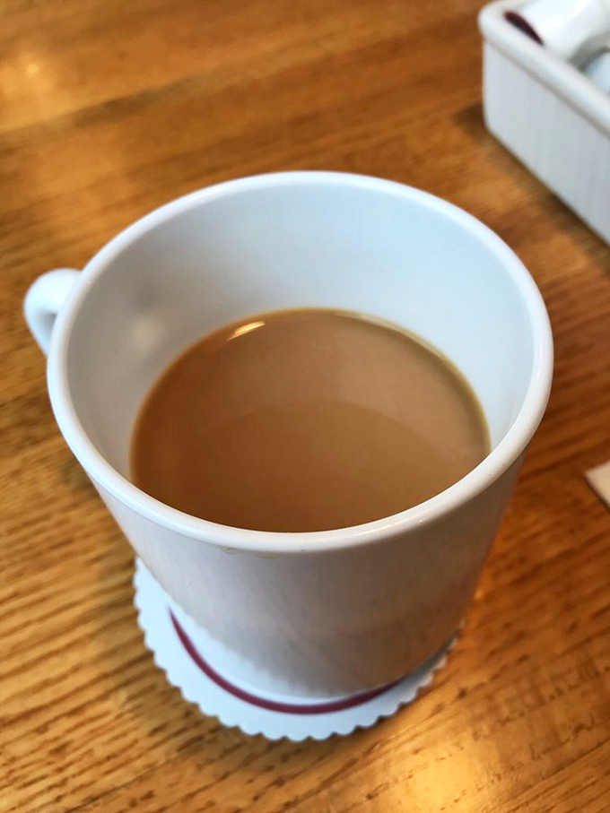 The elixir of morning motivation. This unassuming cup of coffee has probably witnessed more vacation planning than a travel agent.