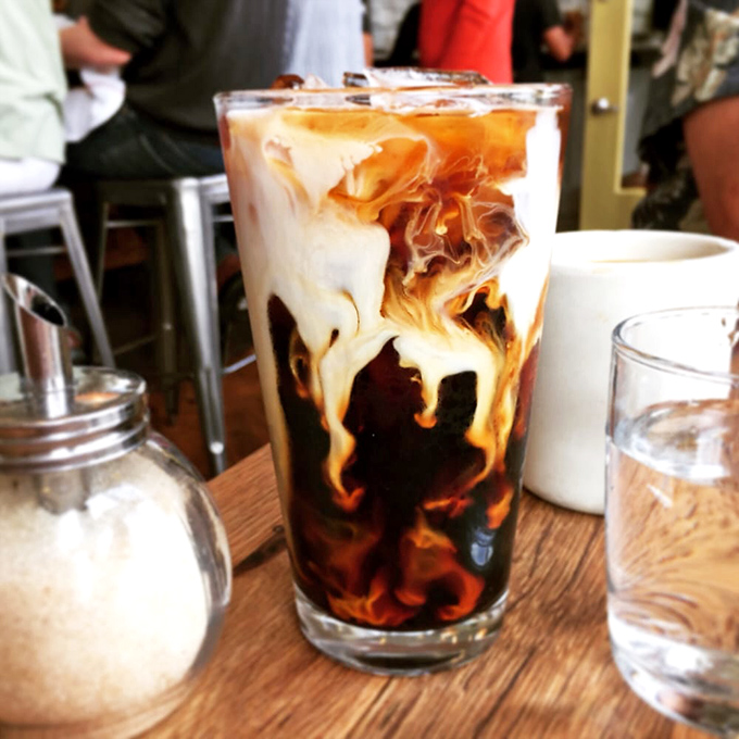 
Coffee art that's practically hypnotic&mdash;swirls of cream meeting dark espresso in a morning dance that beats any alarm clock. 