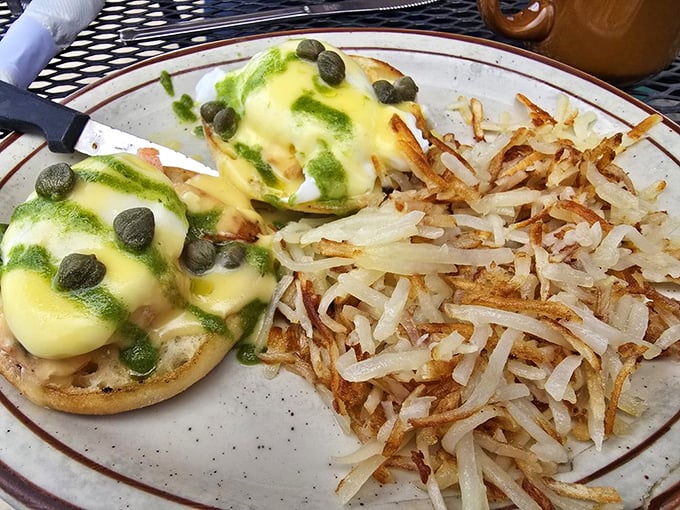 The Colorado Benedict&mdash;where hollandaise meets green chili in a breakfast summit that deserves its own peace prize. Those hash browns are crispy perfection. 