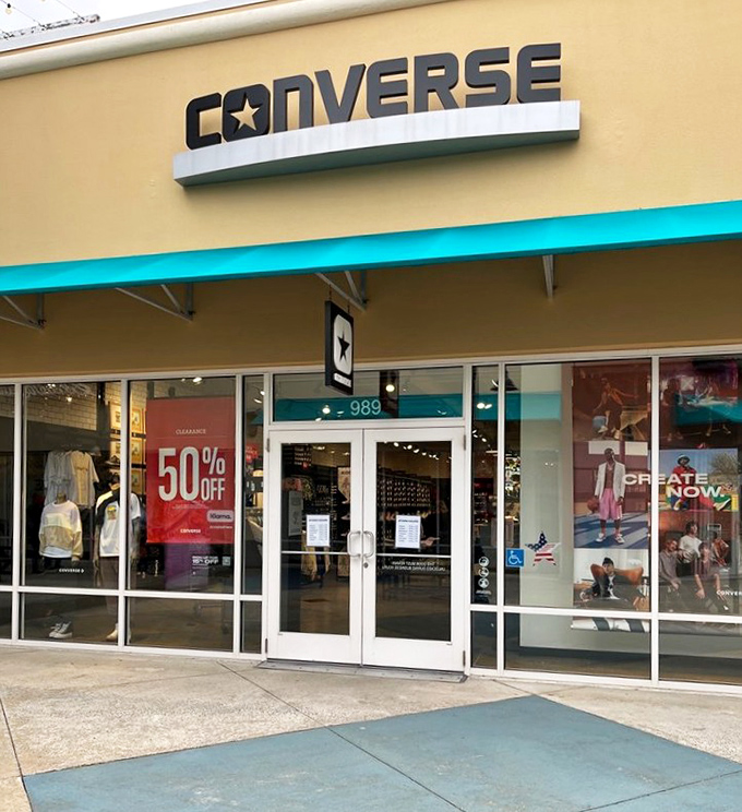 Converse never goes out of style. This 50% off sign is the retail equivalent of finding money in your old jacket pocket.
