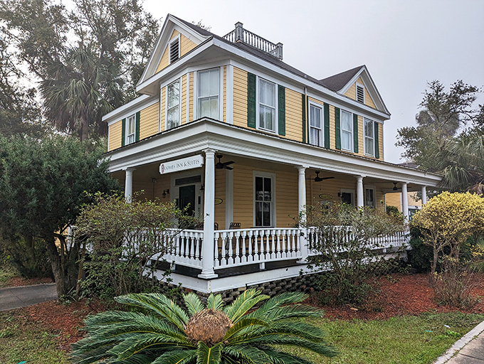 This buttercup-yellow Victorian B&B promises Southern hospitality with a side of architectural eye candy and porch-sitting perfection.