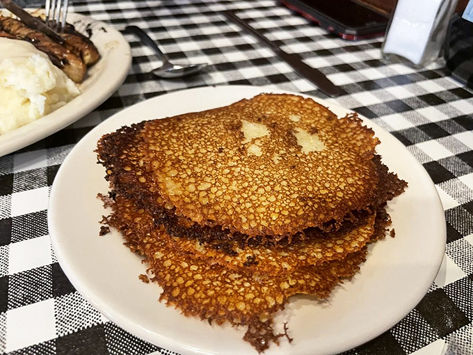 These aren't just cornbread pancakes &ndash; they're crispy-edged discs of happiness that have been making Kentuckians smile for generations.