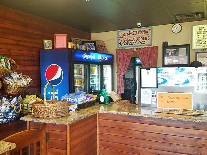 Behind this counter, magic happens with methodical precision&mdash;no fancy equipment, just decades of hot dog craftsmanship at work.