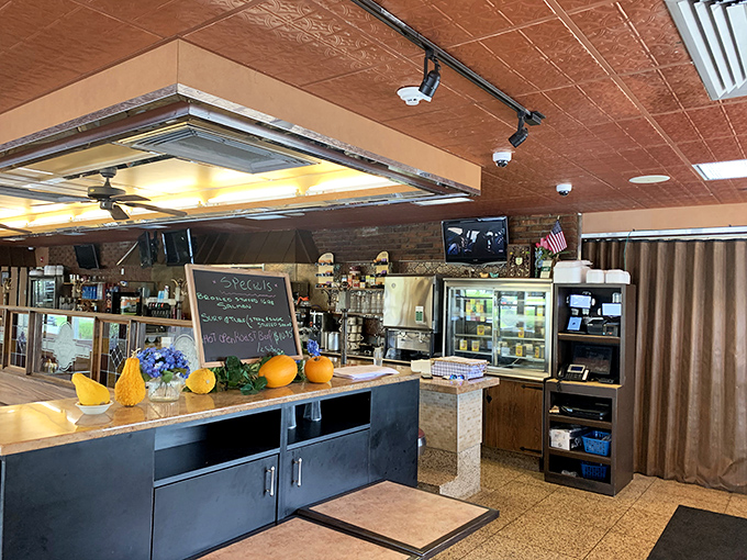 The classic diner counter where locals gather, stories flow, and every meal comes with a side of community warmth.