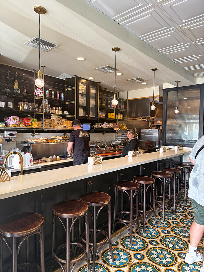 The counter seats offer front-row tickets to the sandwich-making spectacle. Food theater at its most delicious.