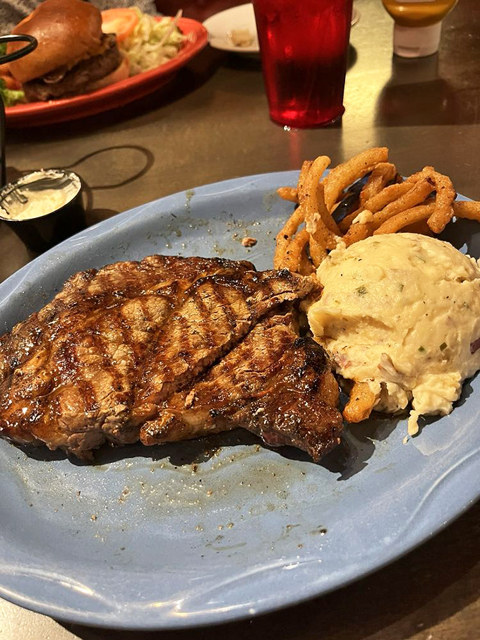 This cowboy ribeye isn't just cooked&mdash;it's been treated with the respect a good piece of beef deserves. The mashed potatoes aren't bad company either.
