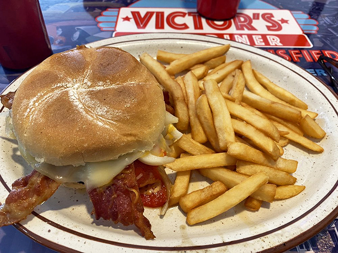 A burger that Dean Martin would approve of&mdash;simple, substantial, and without pretension. Those perfectly golden fries aren't just a side&mdash;they're a declaration of diner principles.