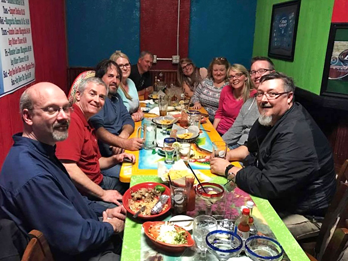 A table of happy diners proves that great Mexican food, like all universal truths, brings people together better than any formal invitation ever could.