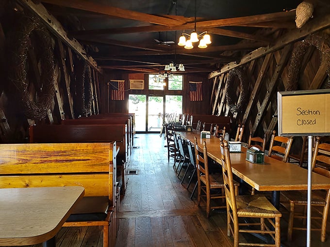 The tunnel-like interior creates a dining experience that's both intimate and communal. Like eating in a wooden cathedral dedicated to comfort food.