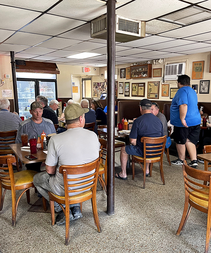 The lunch crowd knows the secret—this is where real Floridians eat, sharing tables and stories over sauce-stained napkins.
