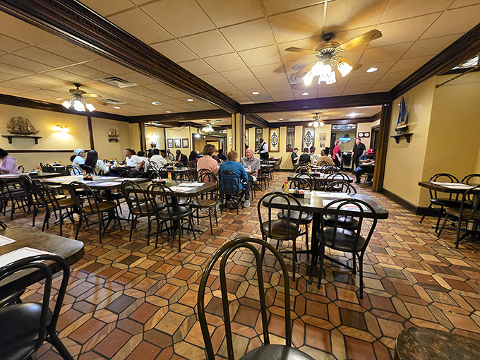 The dining room hums with conversation and the gentle clinking of forks against plates&mdash;a communal experience where strangers become neighbors over shared appreciation of good food.