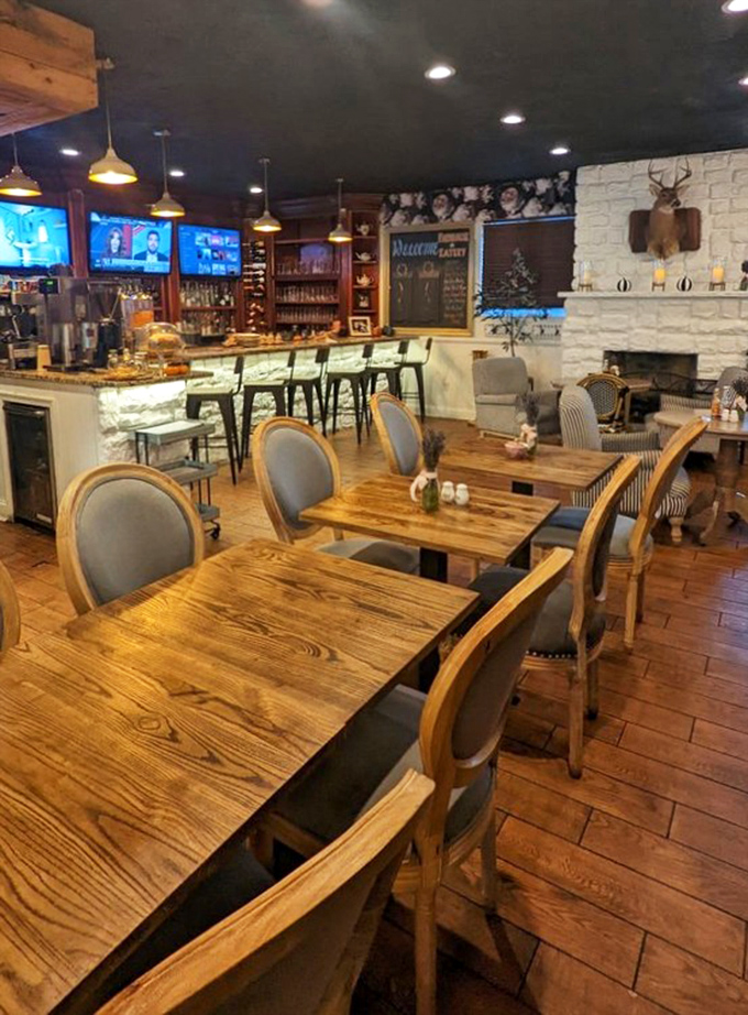 Rustic wooden tables, elegant chairs, and a bar that beckons&mdash;this dining room feels like the sophisticated country home you wish you had.